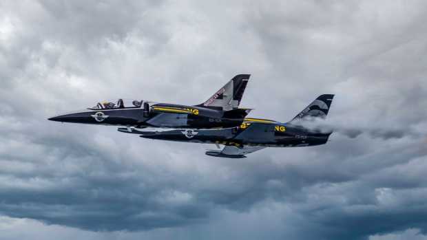 Video Captures Two Military Fighter Jets Flying in Formation Through a ...